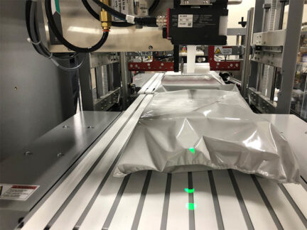 Continuous Motion Packaging Systems - Optimized Automated Mailing Solutions - EPS Series | Texwrap